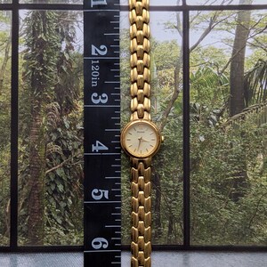 Vintage PULSAR Gold Tone Quartz Watch: Round Bezel, Fits 6.5" Wrist - Etsy