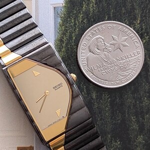 Vintage SEIKO Black and Gold Piano Dial Quartz Watch With New Battery ...