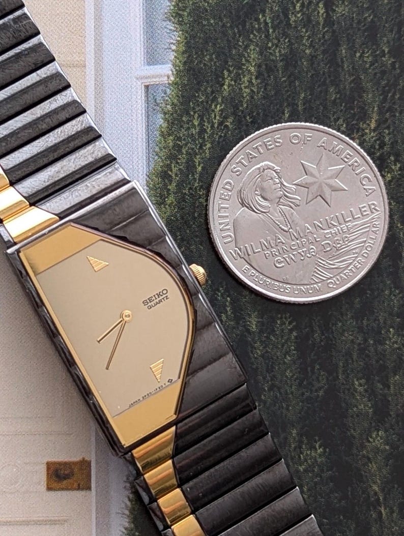 Vintage SEIKO Black and Gold Piano Dial Quartz Watch With New Battery ...
