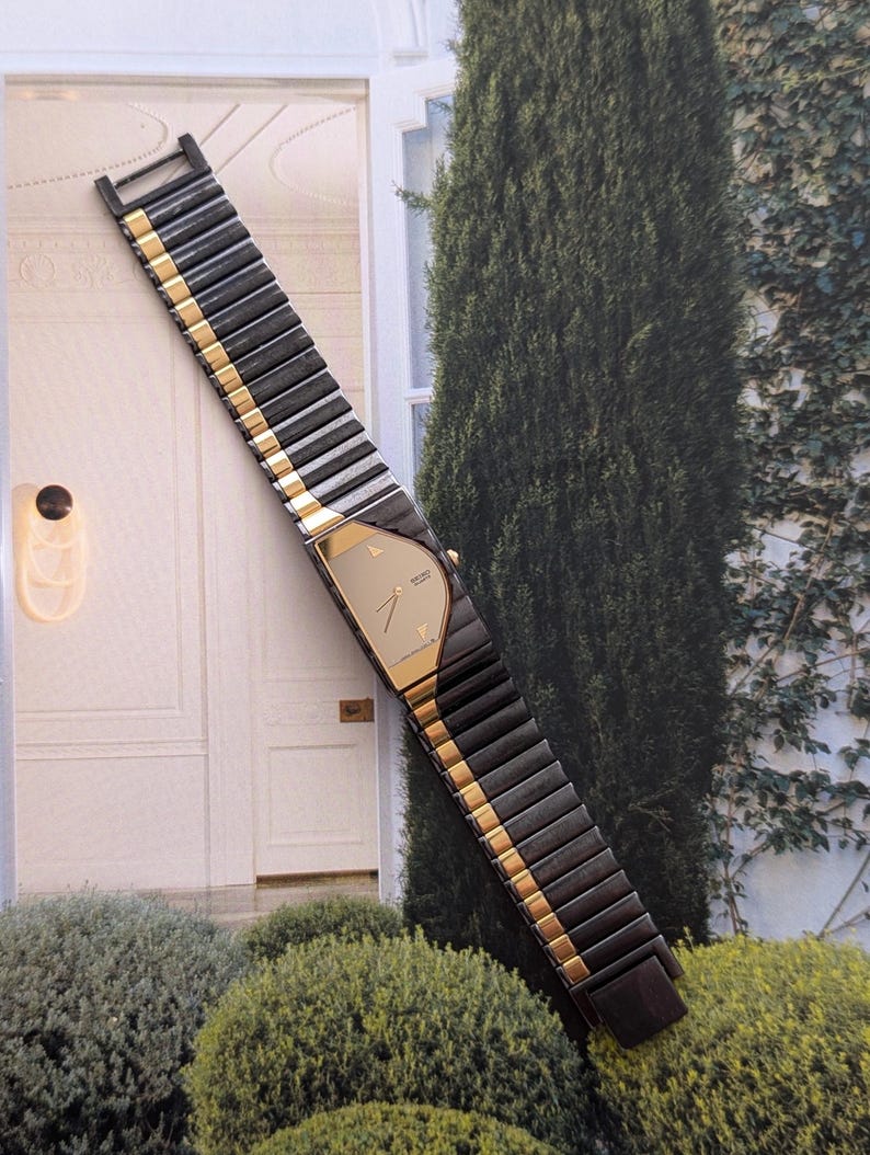 Vintage SEIKO Black and Gold Piano Dial Quartz Watch With New Battery ...