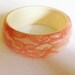 Bangle - Cream Plastic Chunky Plastic Bangle With Pink Lace Inclusion ...