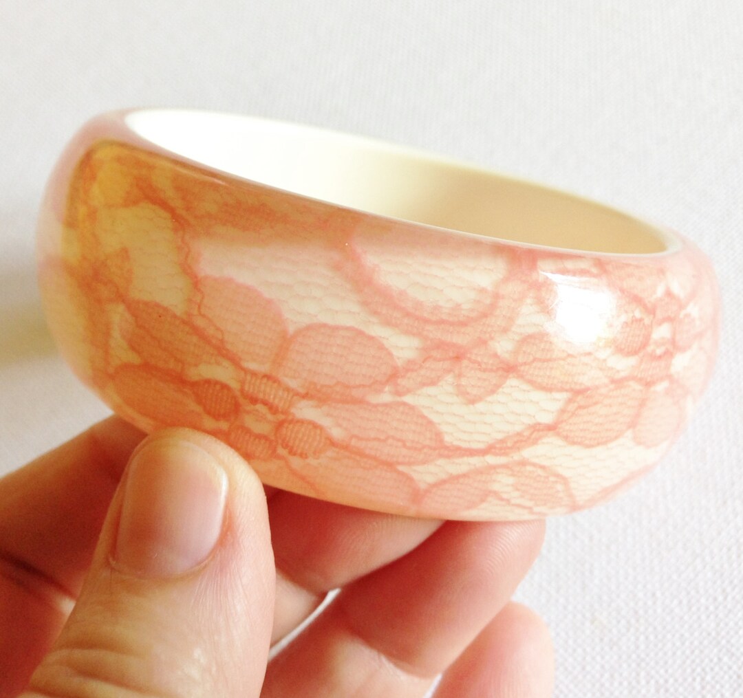 Bangle - Cream Plastic Chunky Plastic Bangle With Pink Lace Inclusion ...