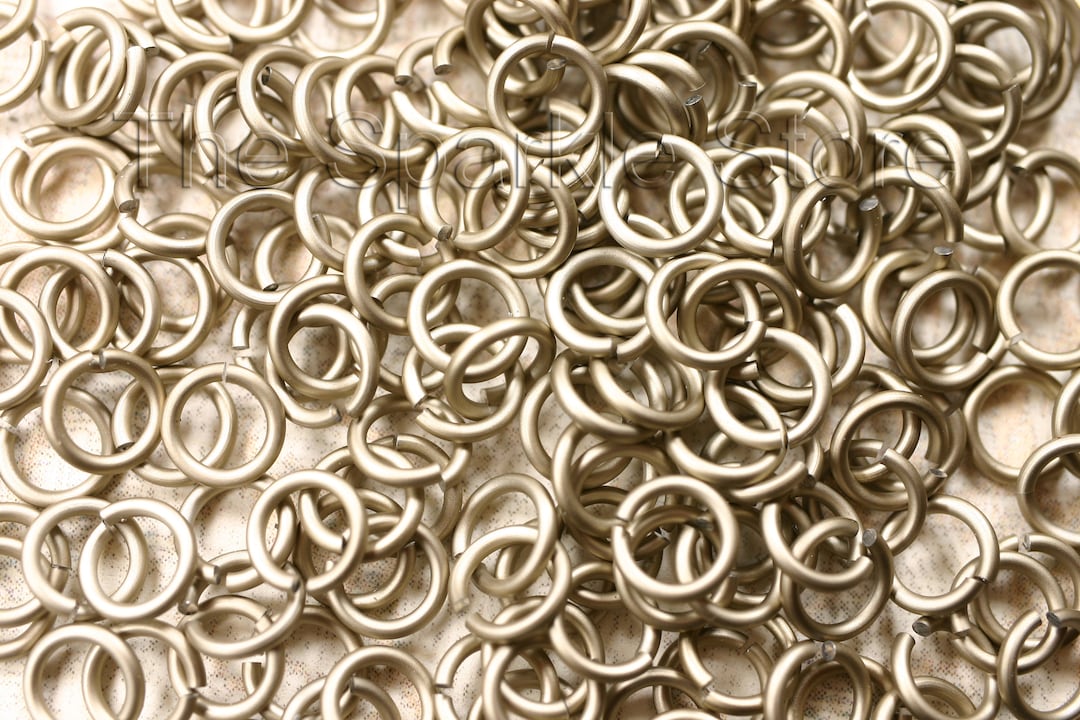 100 18ga Matte Champagne Jump Rings, Anodized Aluminum, 6.2mm OD, 4.2mm (5/33") ID, Matte Beige ...
