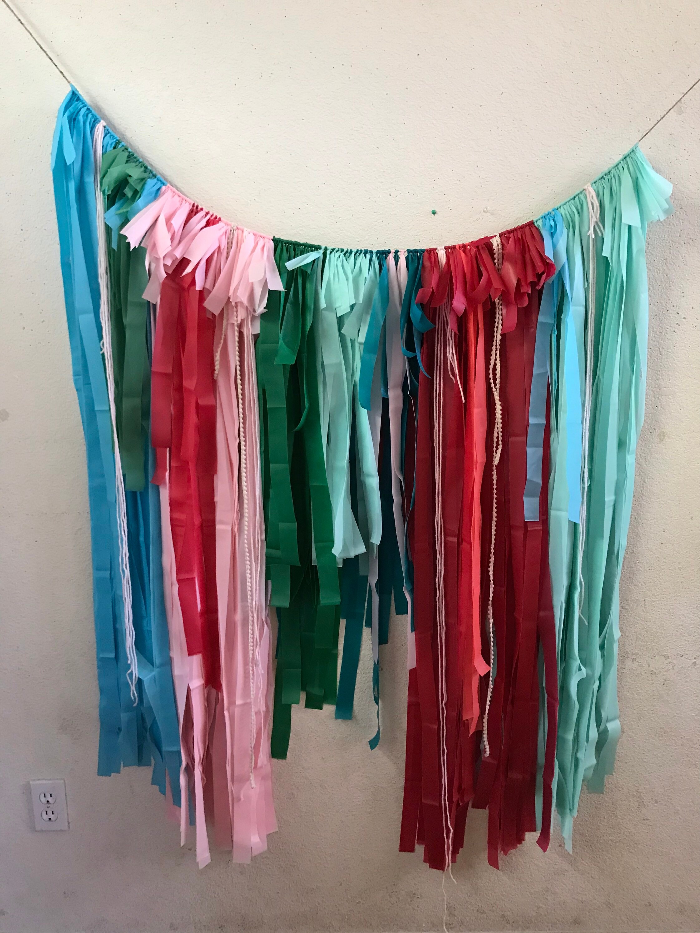 Christmas 4ft x 4ft plastic fringe backdrop with yarn and pom | Etsy