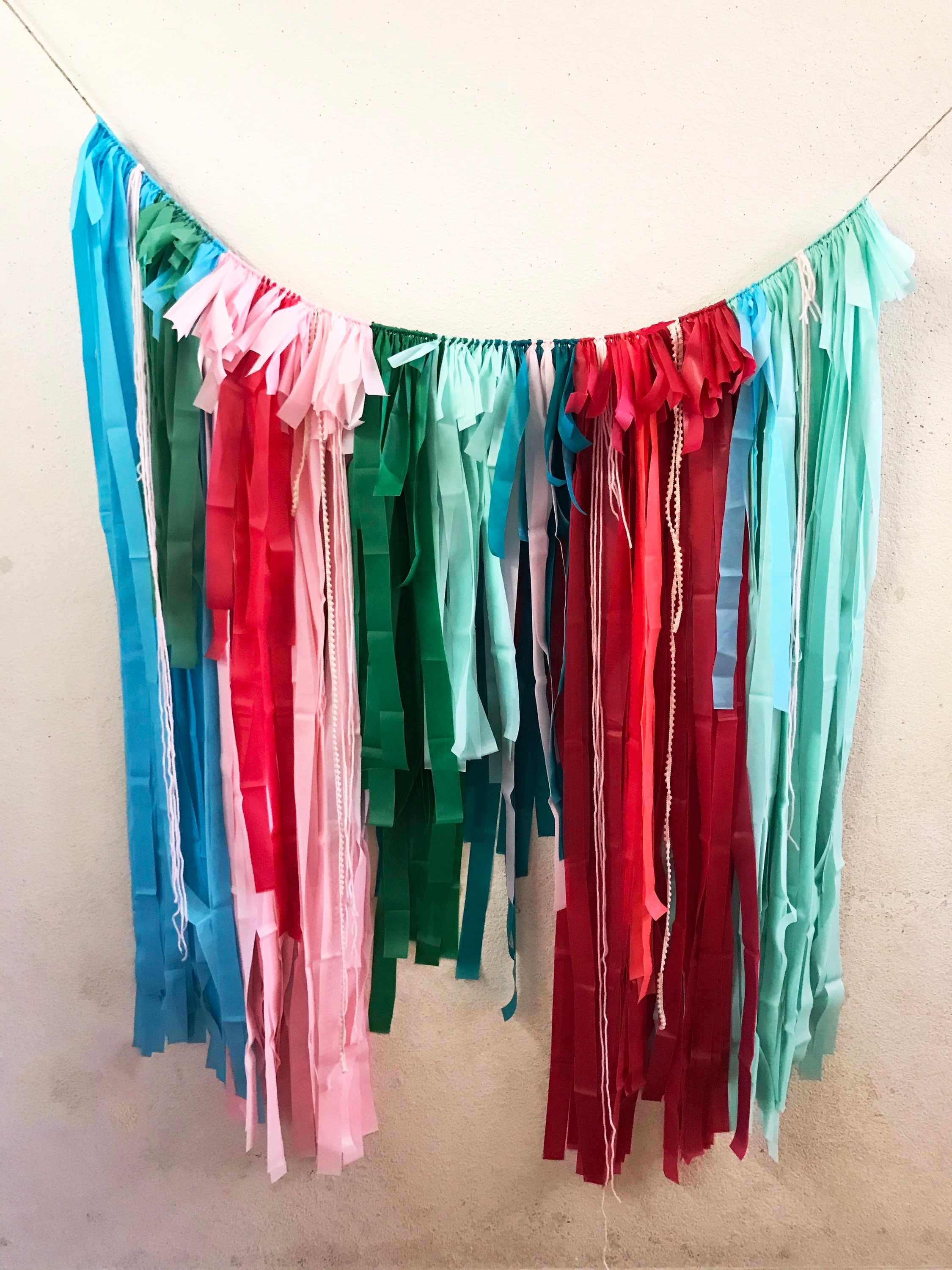 Christmas 4ft x 4ft plastic fringe backdrop with yarn and pom | Etsy