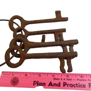 Antique Rusty Cast Iron Skeleton Keys, Gate Jail Pirate Keys on Welded ...