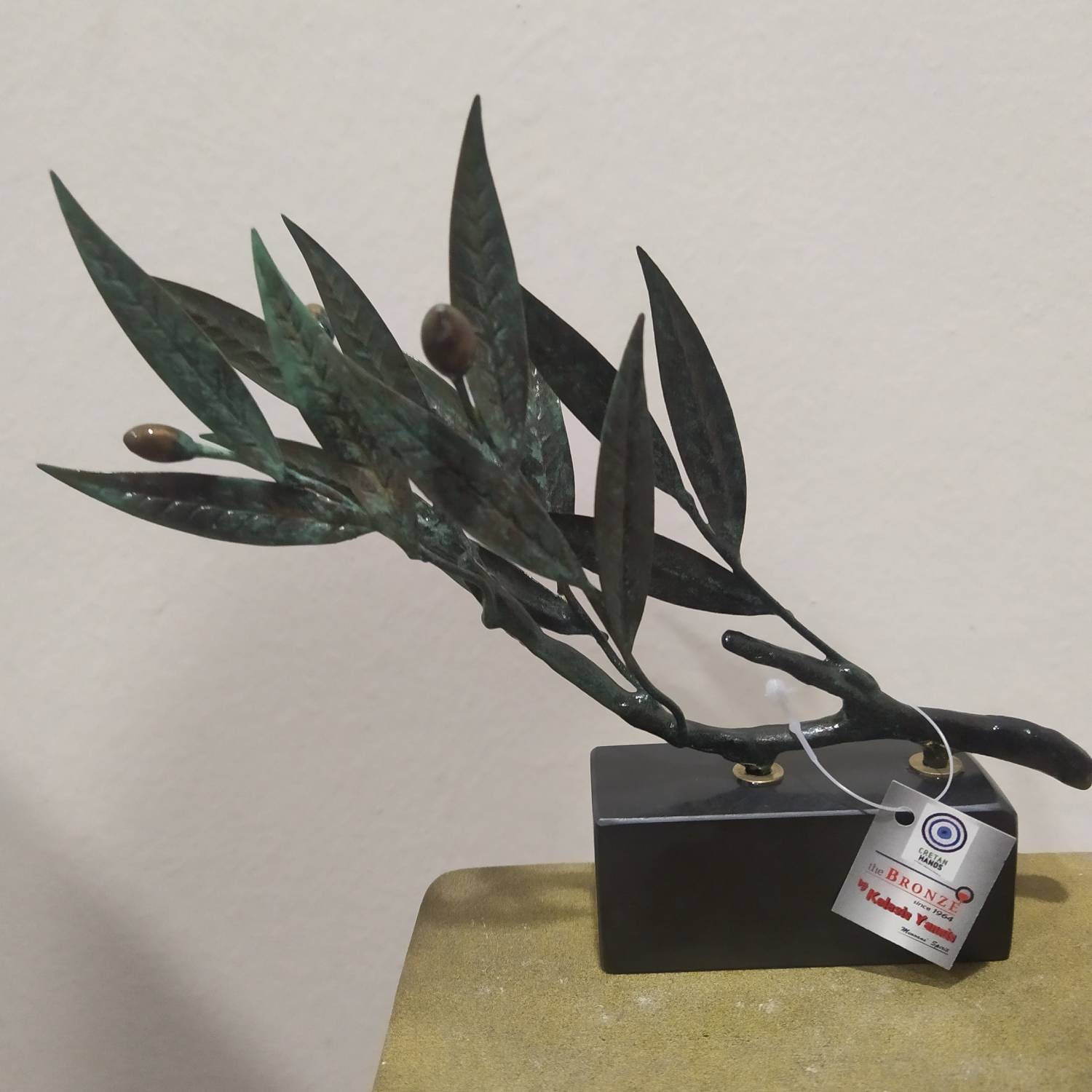 Bronze casting olive branch on marble base | Etsy