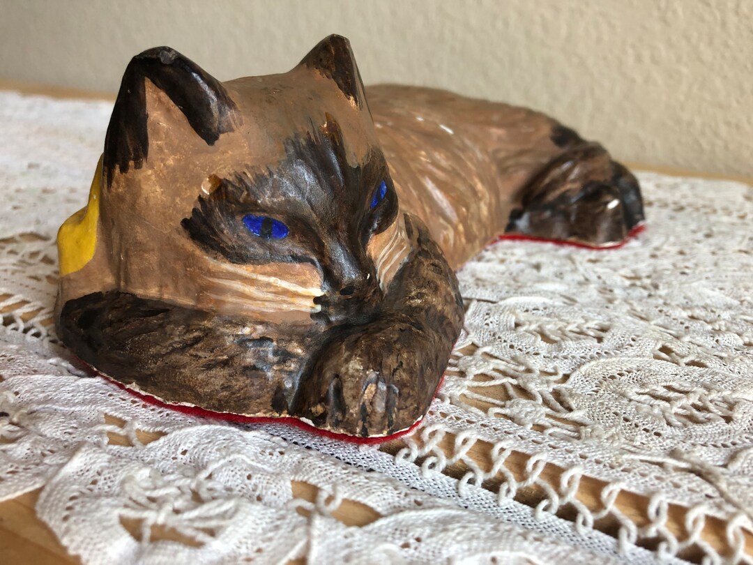 A Rustic Chippy Chalkware/plasterware Reclining Brown Cat With Blue ...