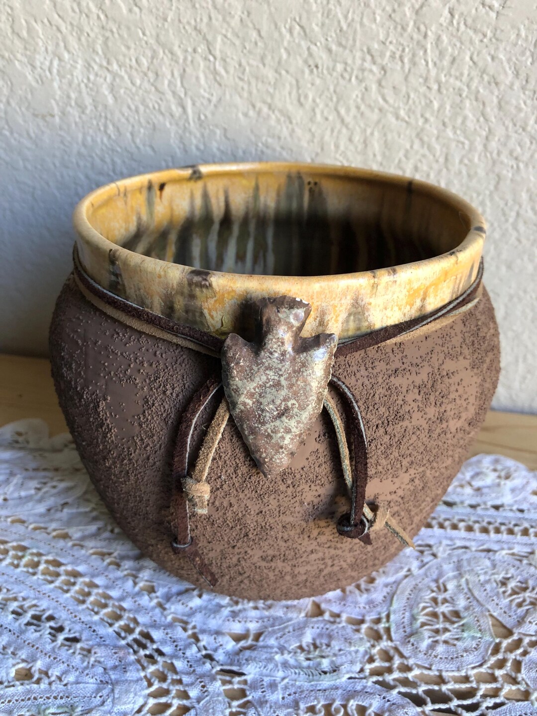A Rustic Ceramic Pottery Planter/vase With an Arrowhead Style Item Tied ...