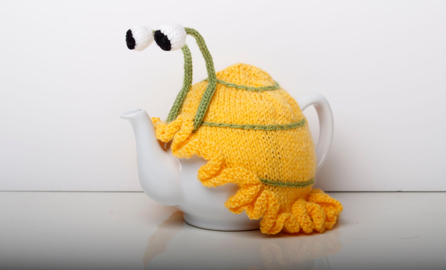 Knitted yellow snail tea cosy with frilly bottom. 6 cup and 2 | Etsy