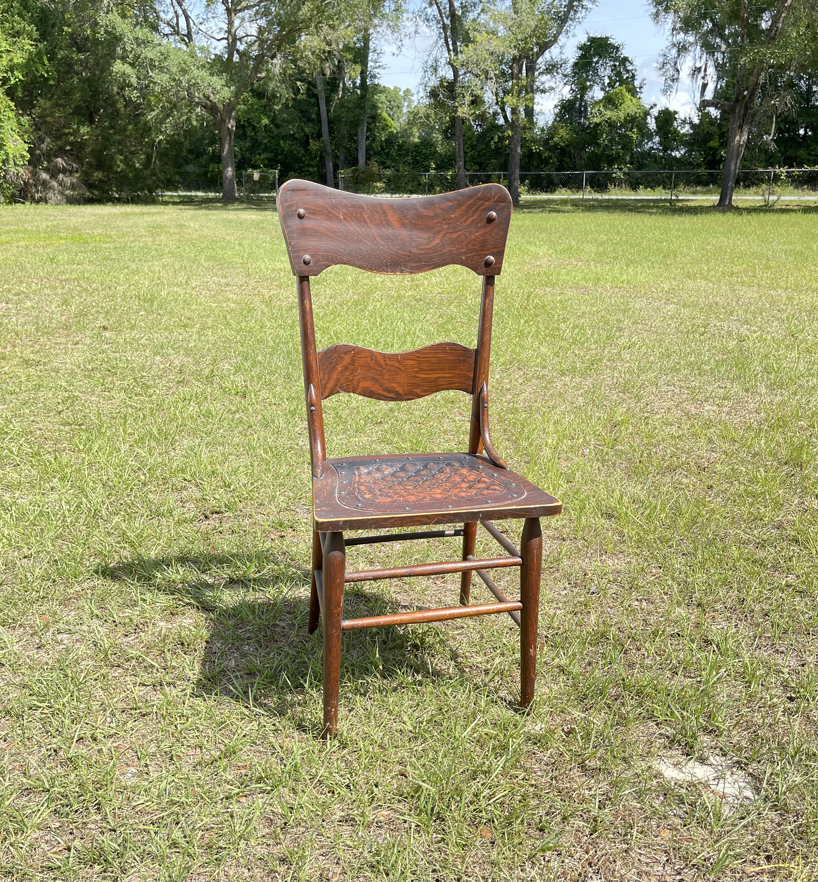 Antique wooden chair with leather seat store