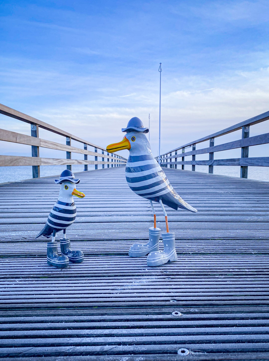 Seagull Made of Carved Wood in a Gray and White Suit With Rubber Boots ...