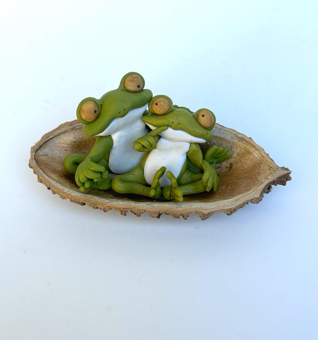 Two Clay Frogs Sitting in a Seed Pod Sitting Sculpture Figurine - Etsy