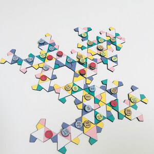 Polyplots Math Game and Brainteaser Using Aperiodic Einstein Hats ...