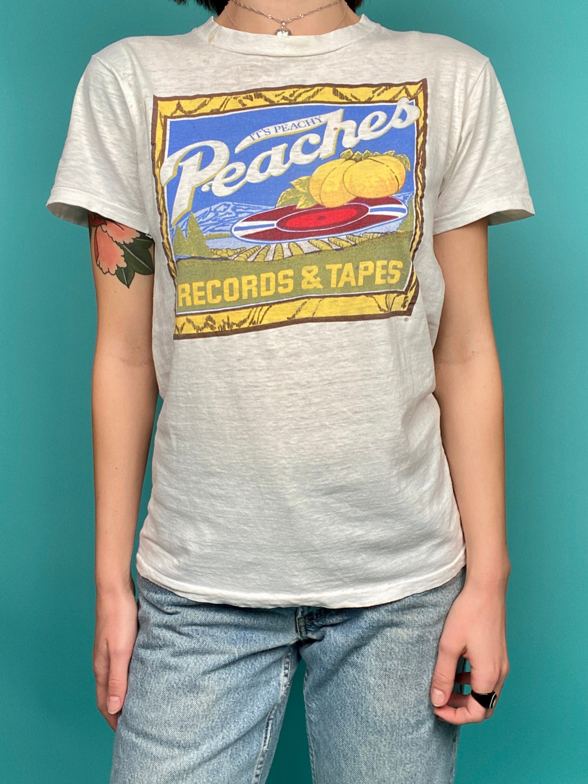 1970s Peaches Records and Tapes T-Shirt sold by Jessica Alba | SKU ...
