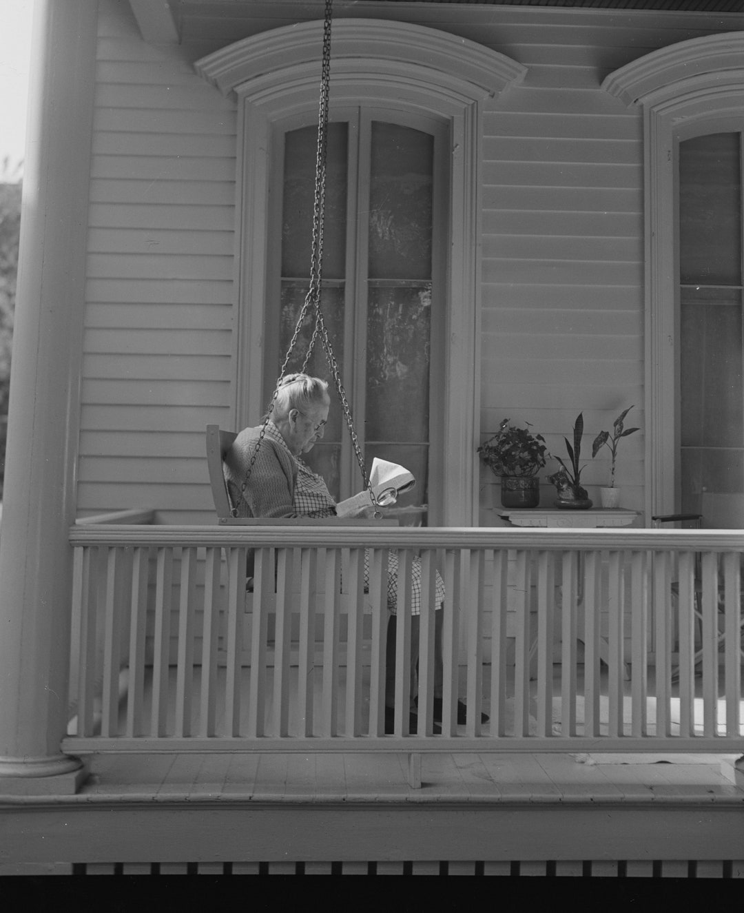 Woman Reading Newspaper on Front Porch, Elgin, Illinois, 1940's, Old ...