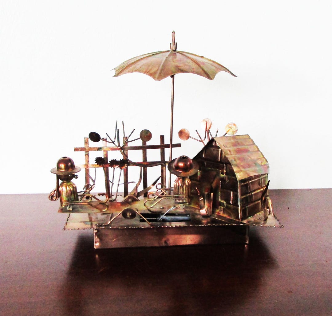 Retro 1970s Music Box Seesaw in Playground With Umbrella and Shack ...