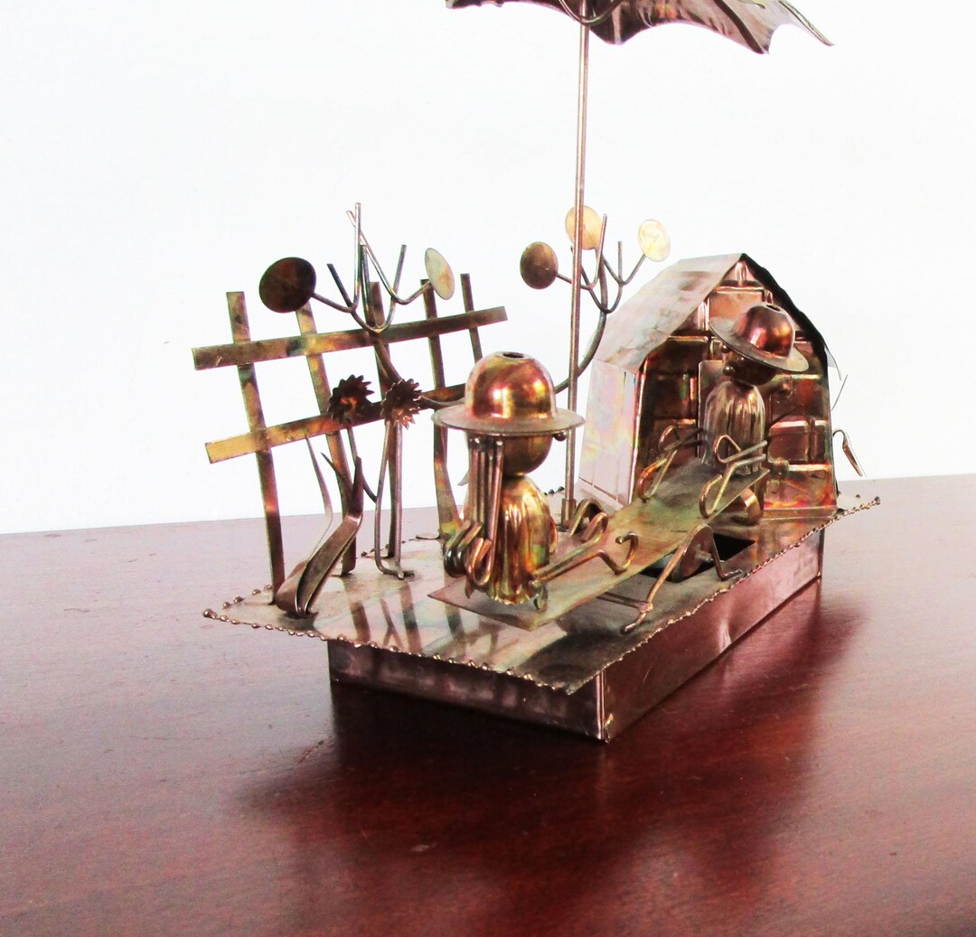 Retro 1970s Music Box Seesaw in Playground With Umbrella and Shack ...