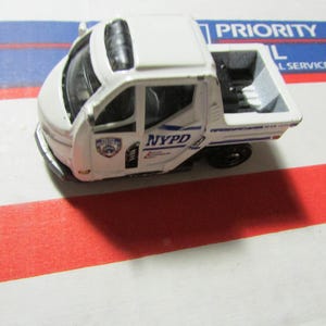 Matchbox NYPD Parking Enforcement Scooter White Car Truck Pre Owned 1/ ...