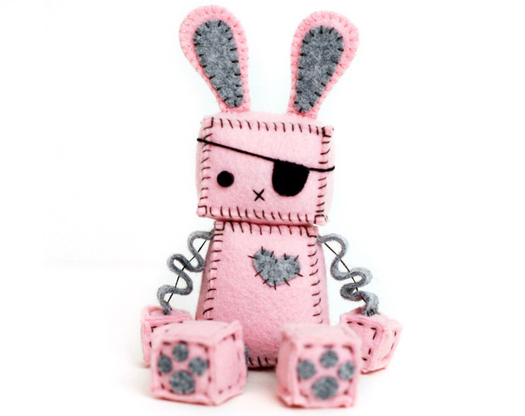 Pink Punk Robot Bunny With an Eye Patch, Bunny Ears and Paw Prints ...