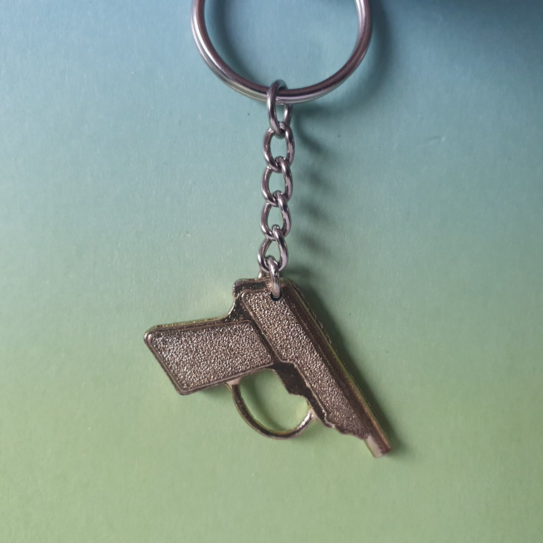 Revólver de oro. Pieza Cluedo Vintage - Etsy España