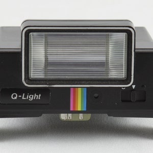 Polaroid Q-light Black Rainbow Stripe Electronic AA Battery Powered ...