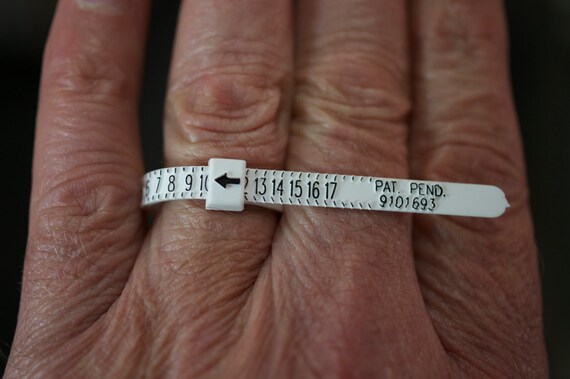 Items similar to Plastic adjustable ring sizer. on Etsy