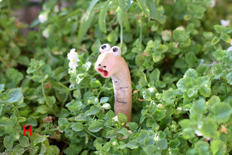 Squiggly Wigglies Garden or Pot ornament | Etsy