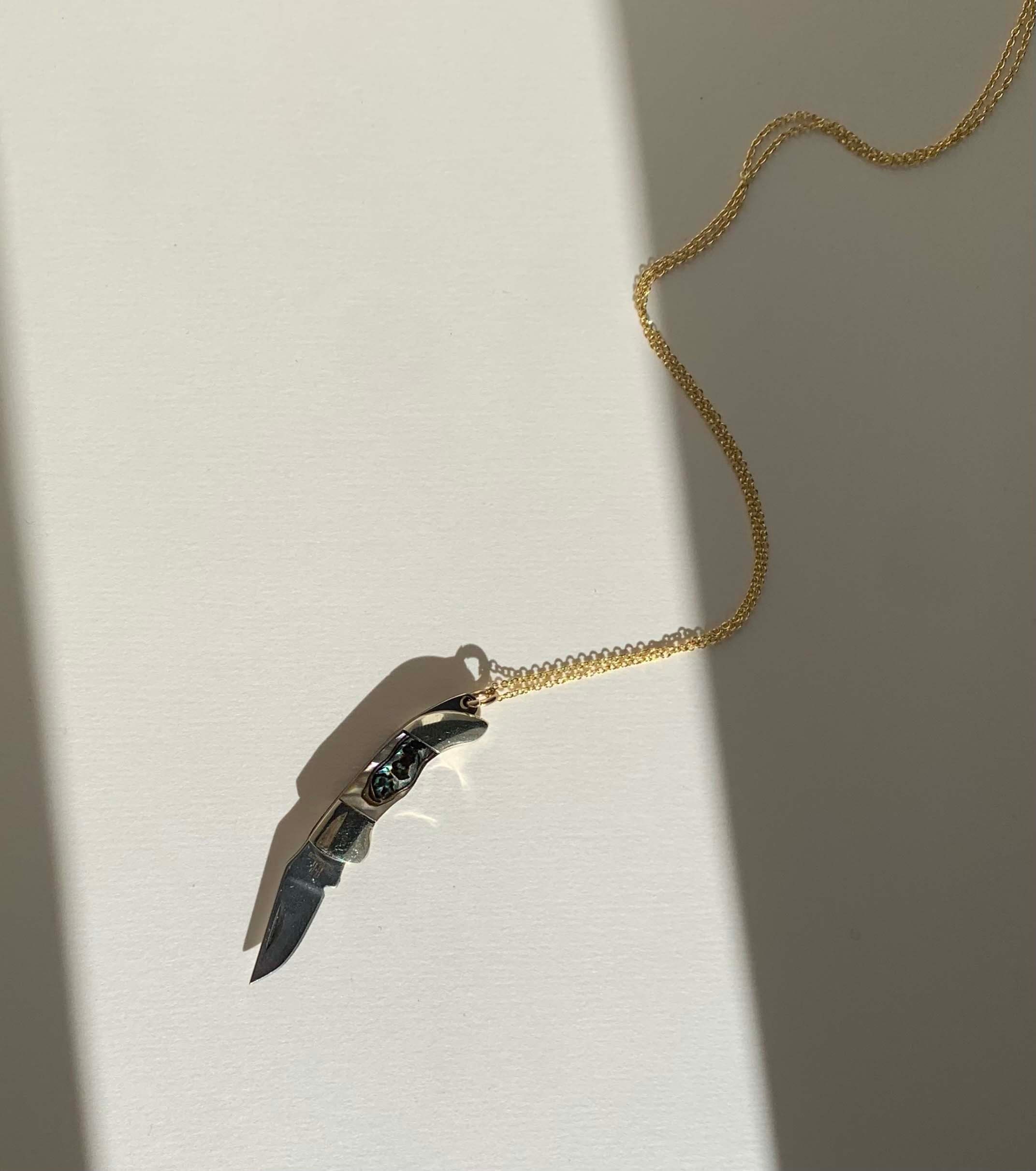 Hidden Knife Necklace