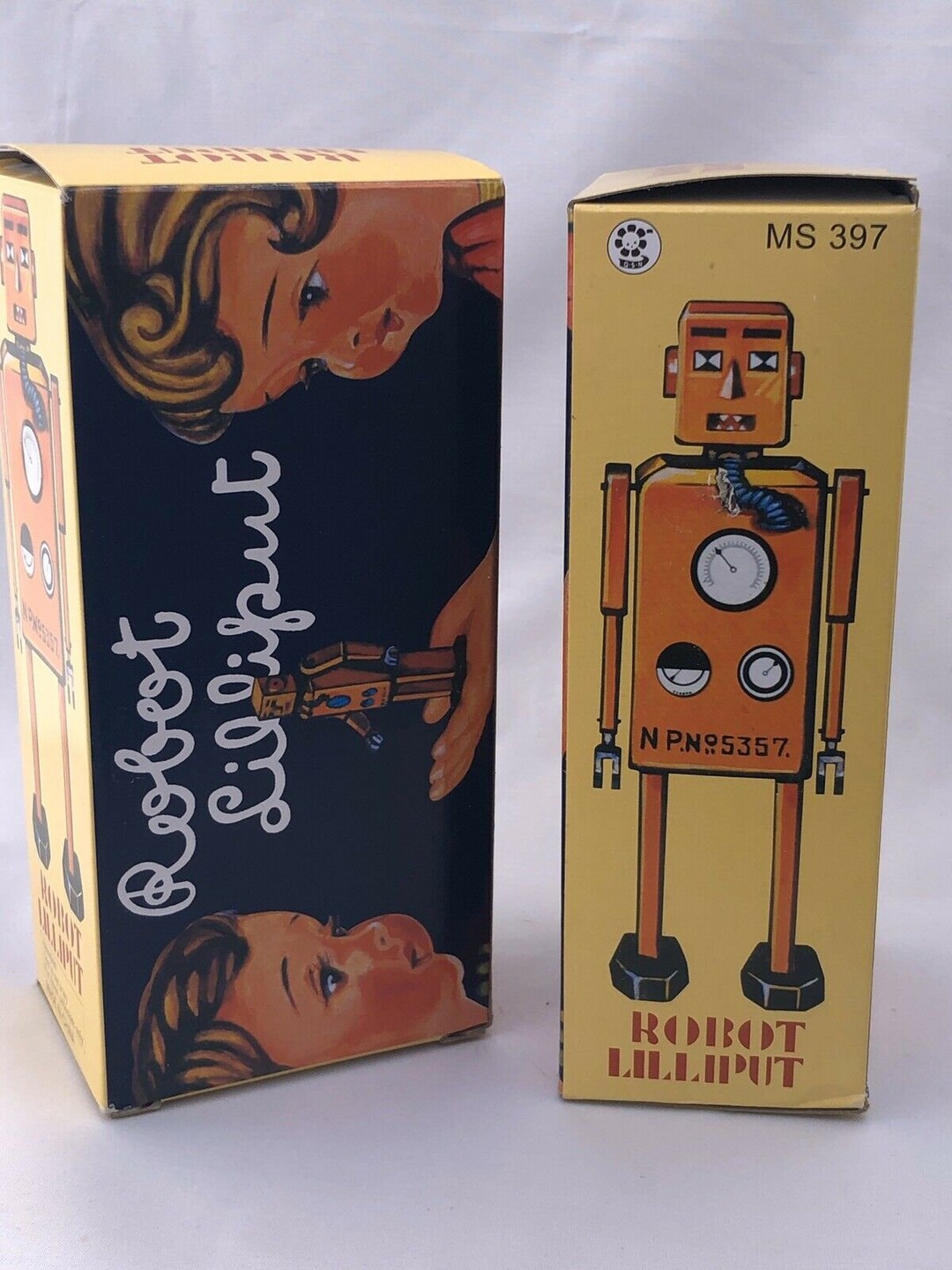 2 Classic Tin Toy Robots Lilliput Yellow and Blue Wind-up - Etsy