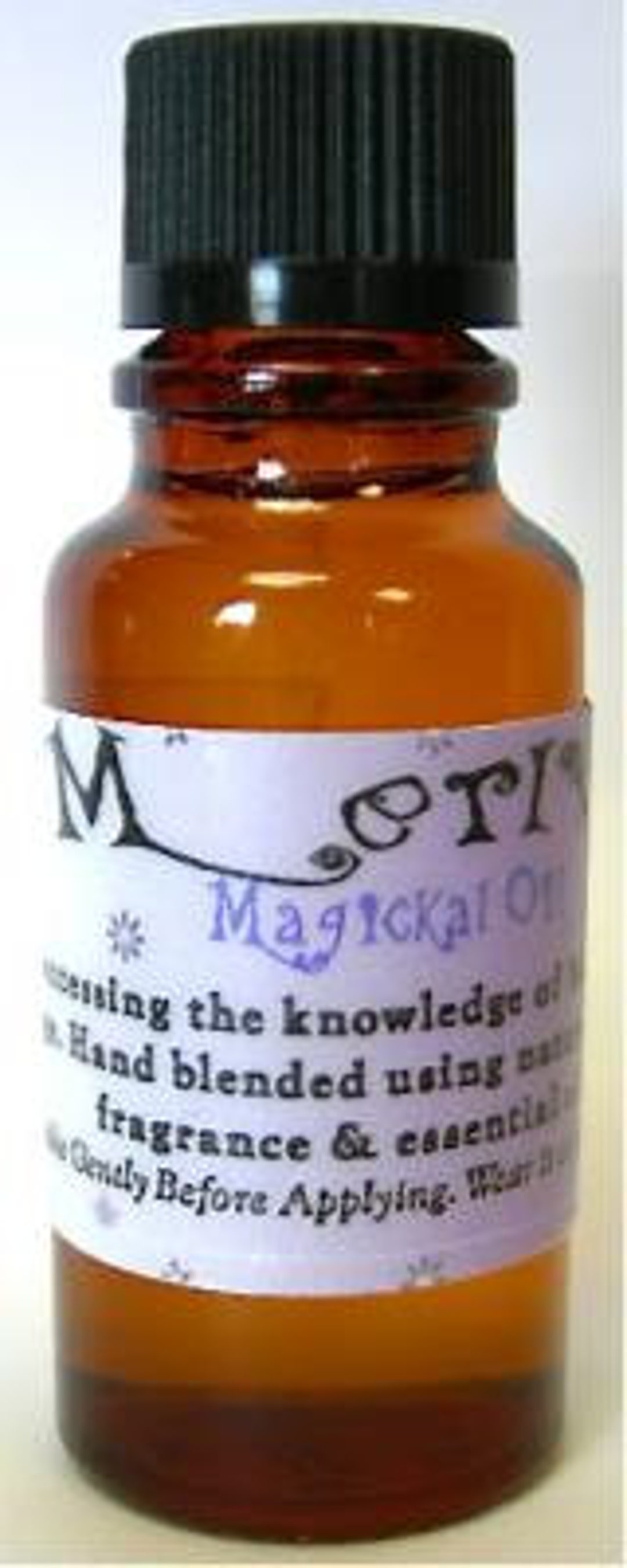 Merlin Magickal Oil - Etsy
