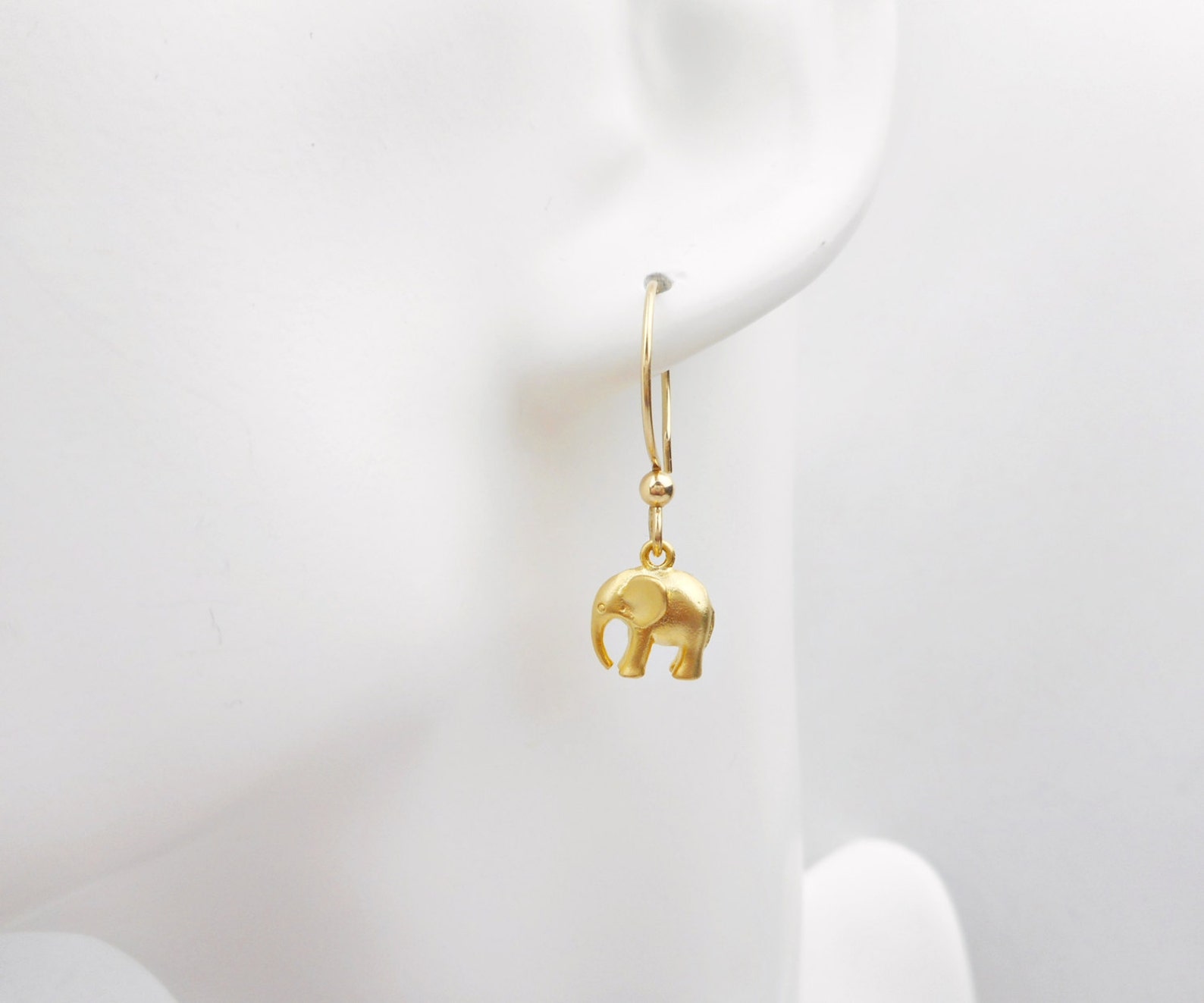 Little Matte Elephant Earrings Matte Gold Elepant Earrings on Gold ...