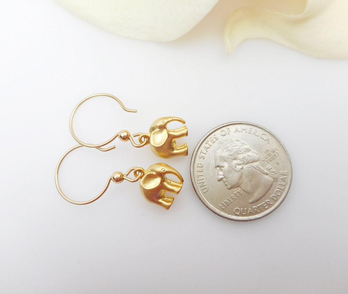 Little Matte Elephant Earrings Matte Gold Elepant Earrings on Gold ...