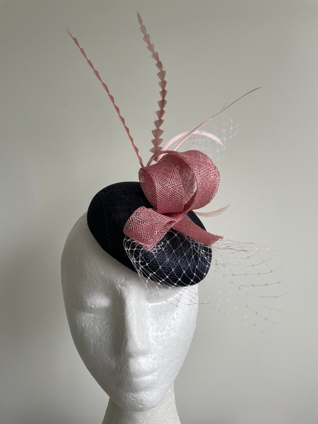 Navy Fascinator With Round Base and Pink Loops, Netting and Feathers ...