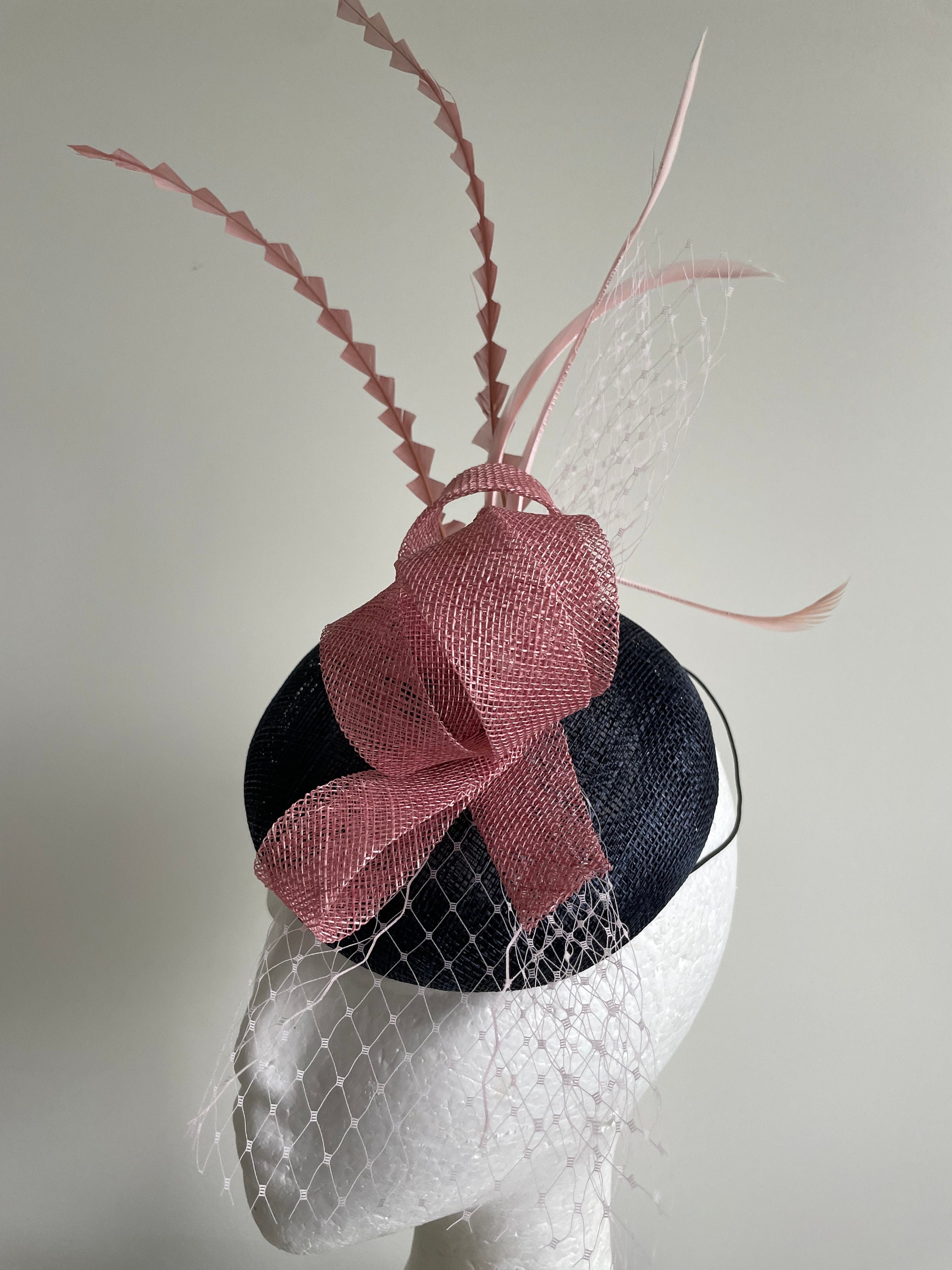 Navy Fascinator With Round Base and Pink Loops, Netting and Feathers ...