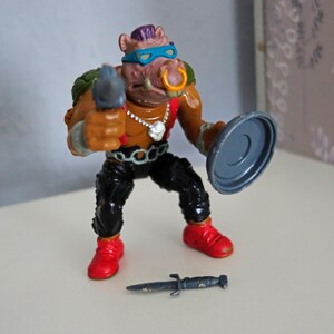 A Vintage 1988 Bebop Warthog soft Head Shredder Henchman Action Figure ...