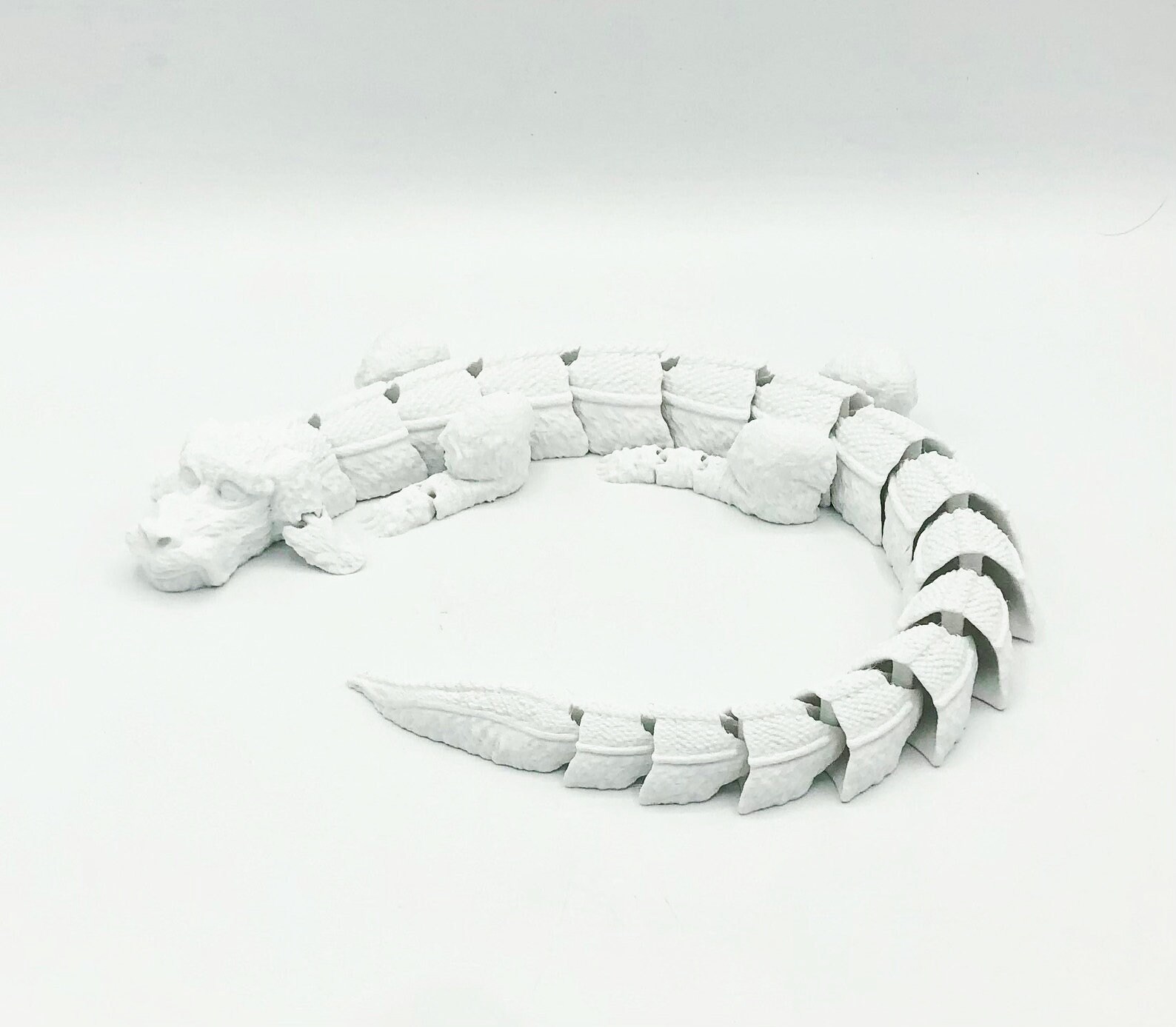 Falkor Articulated 3D Printed Toy by Hex3d Inspired by the Neverending ...