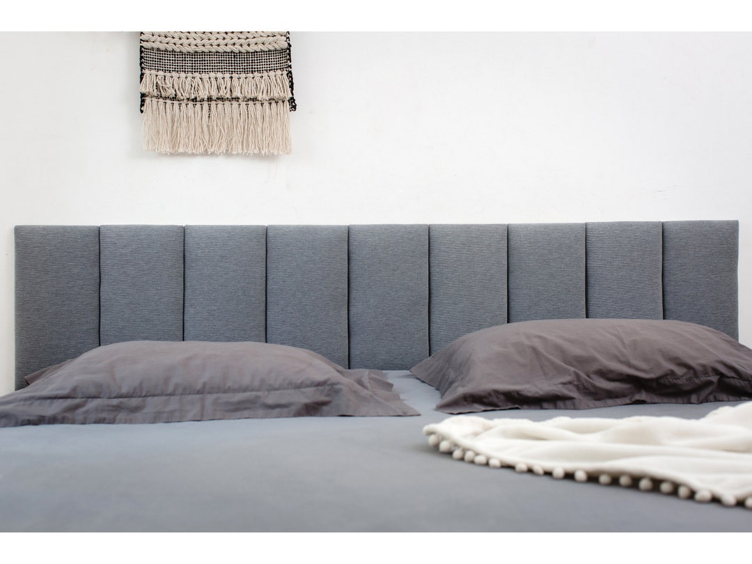 Grey material bed head store