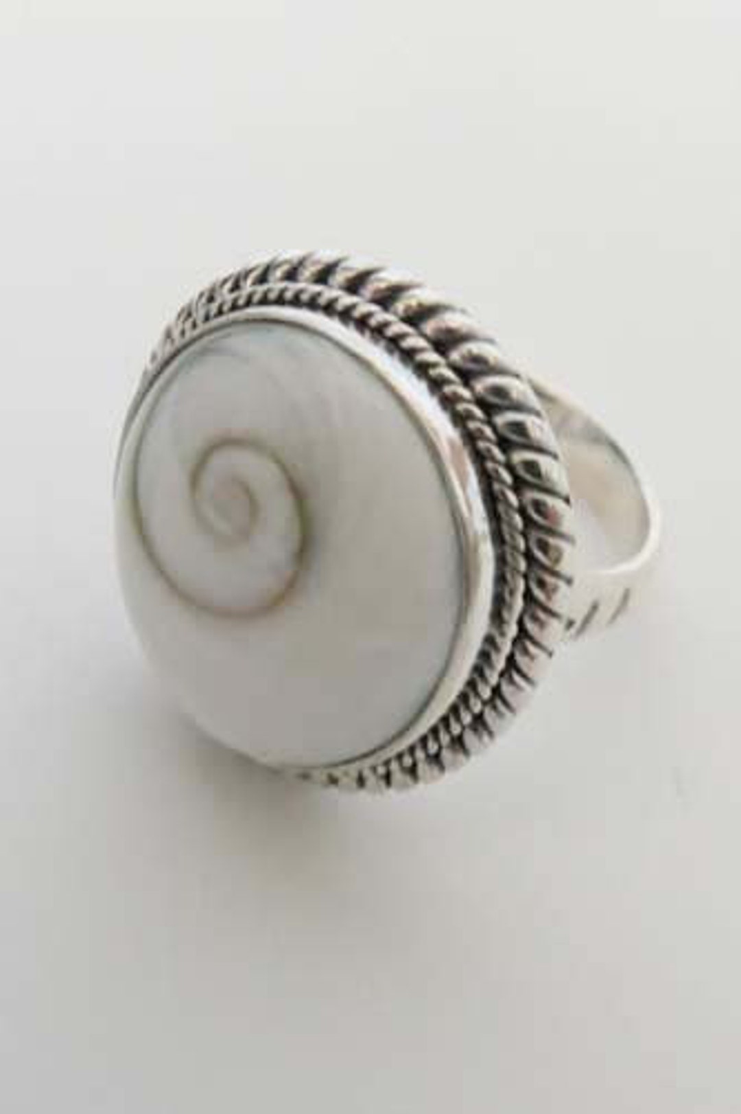 Plaited Silver Edge Ring With White Spiral Shell, Koru Shell, Shiva Eye ...