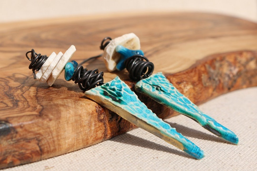 Lizard Skin Daggers and Ostrich Egg Shell Earrings - Etsy