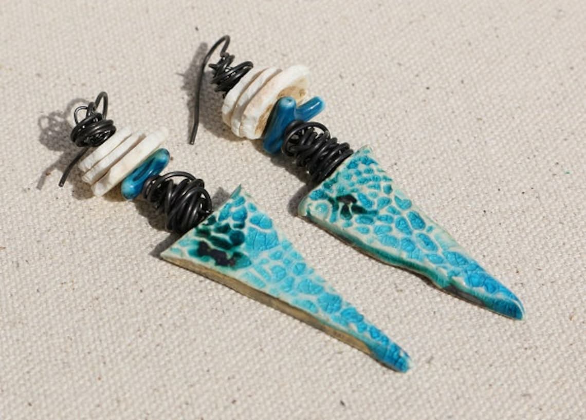 Lizard Skin Daggers and Ostrich Egg Shell Earrings - Etsy