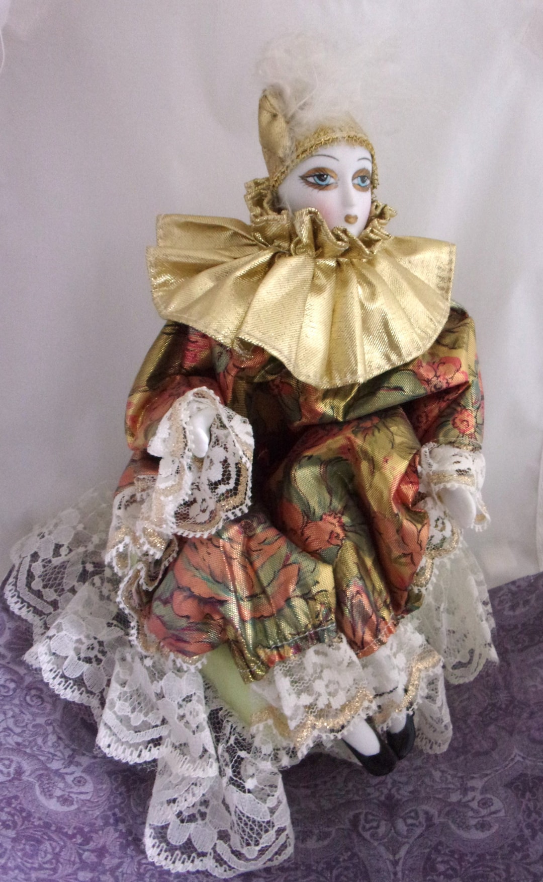 Porcelain Musical Harlequin Jester Rotating Doll, Lady Jester on a ...
