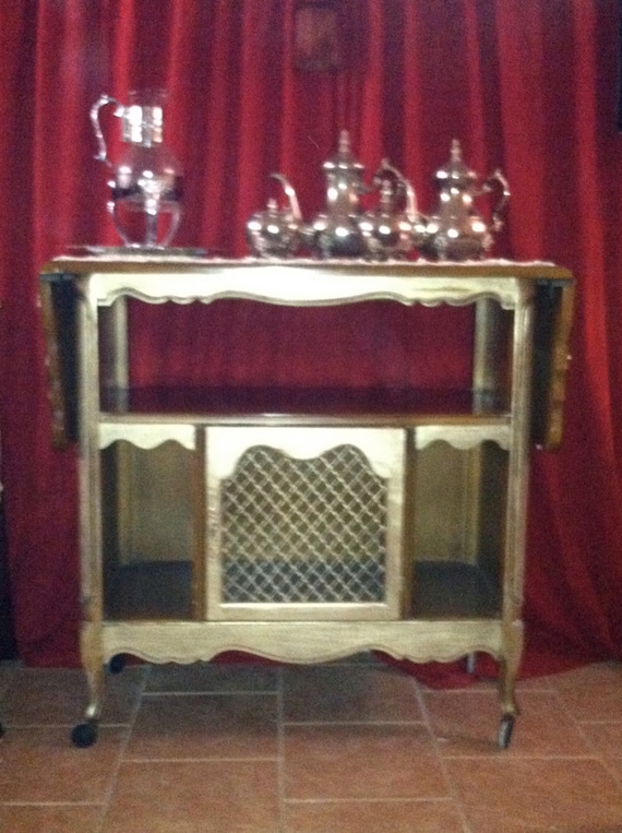 Items similar to Antique bar or server cart. on Etsy
