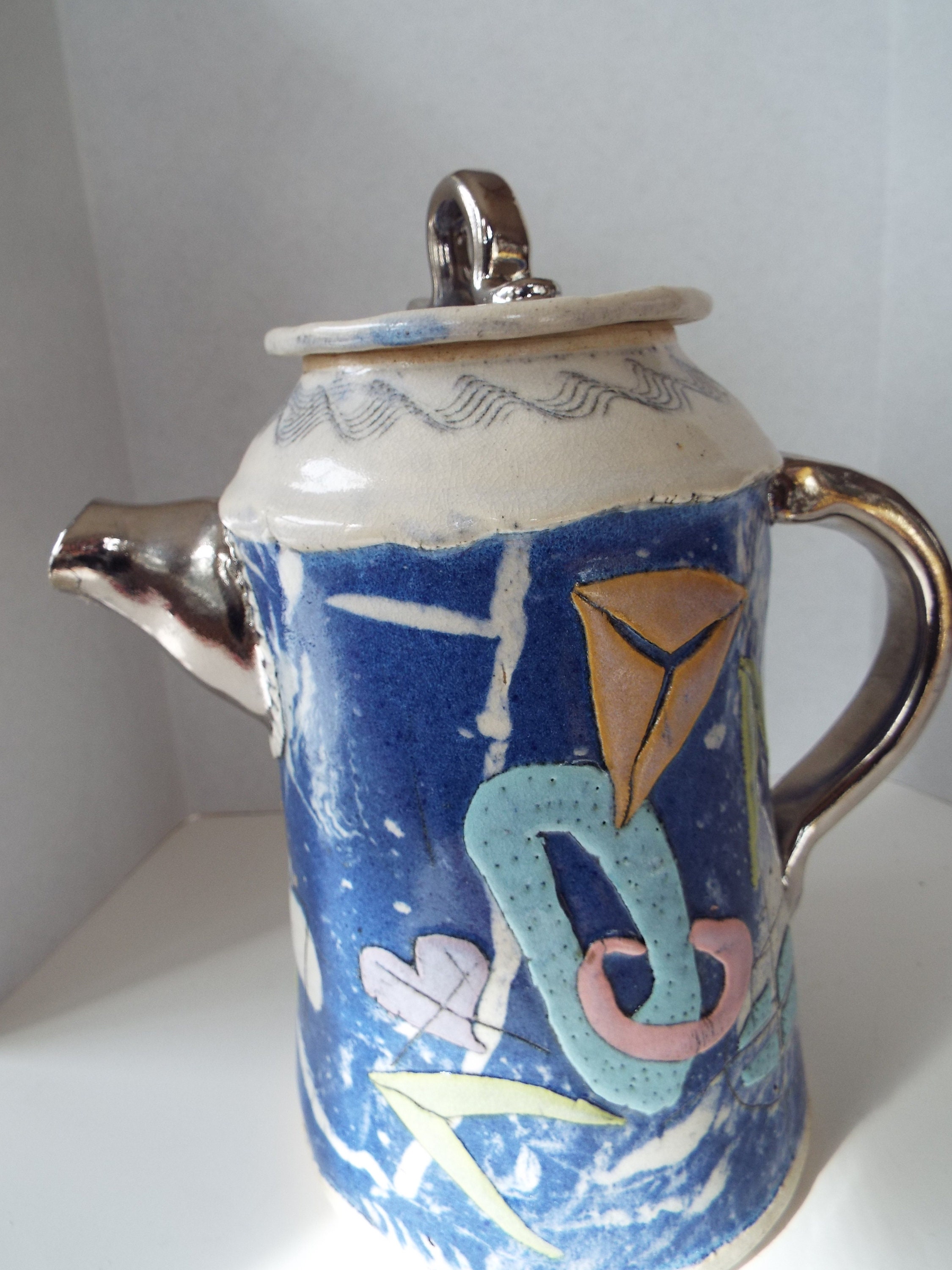 Abstract Clay Teapots