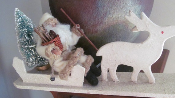 Collectible Wooden German Santa Claus Figurines from the Erzgebirge