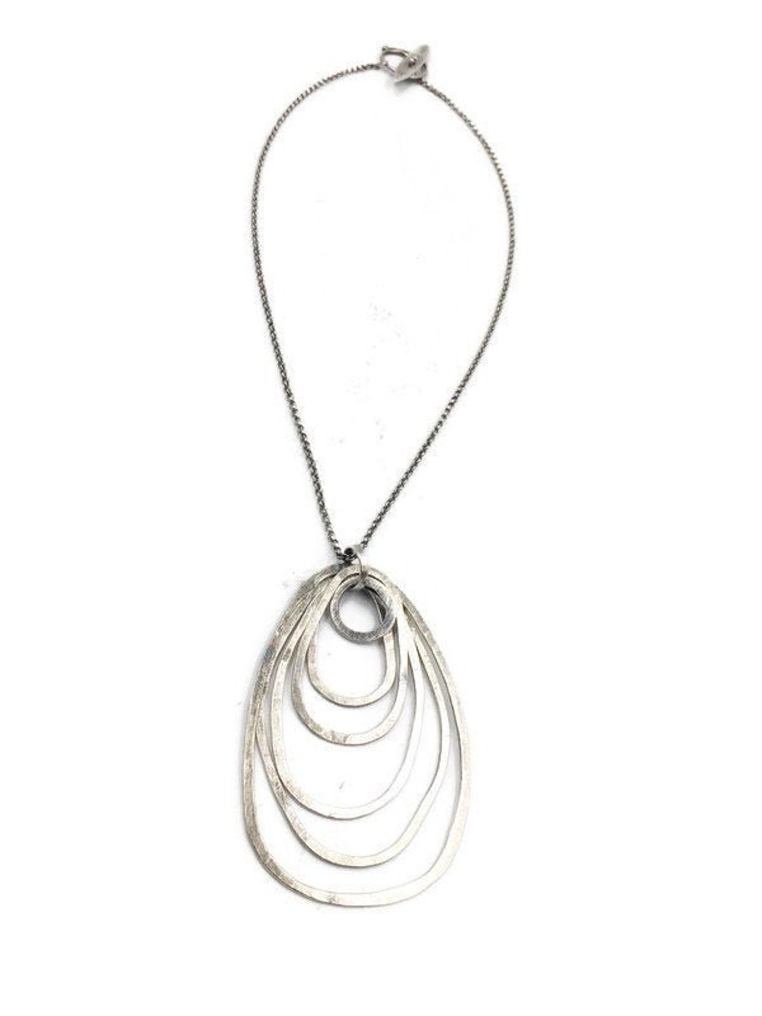 Sterling Silver Overlapping Loops Pendant on Chain. - Etsy