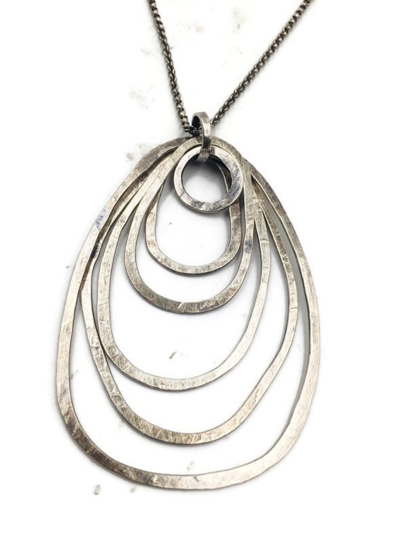 Sterling Silver Overlapping Loops Pendant on Chain. - Etsy