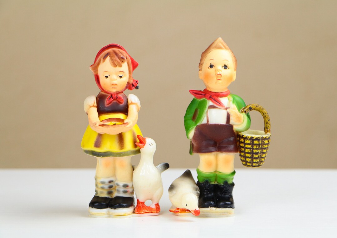 Vintage set of 2 Hummel like plastic figurines - boy and girl with ...