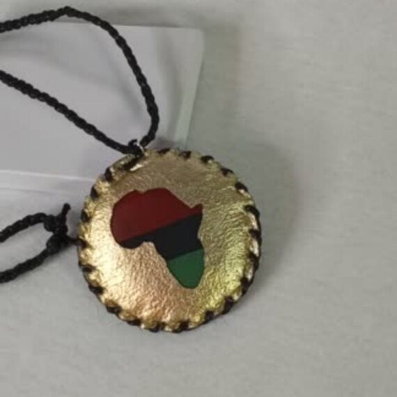 Metallic Gold 1990s Africa Medallion With Black Handbraided | Etsy