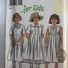 New Look 6484 Sewing Pattern Six Sizes in One Dresses for Kids Sizes 4 ...